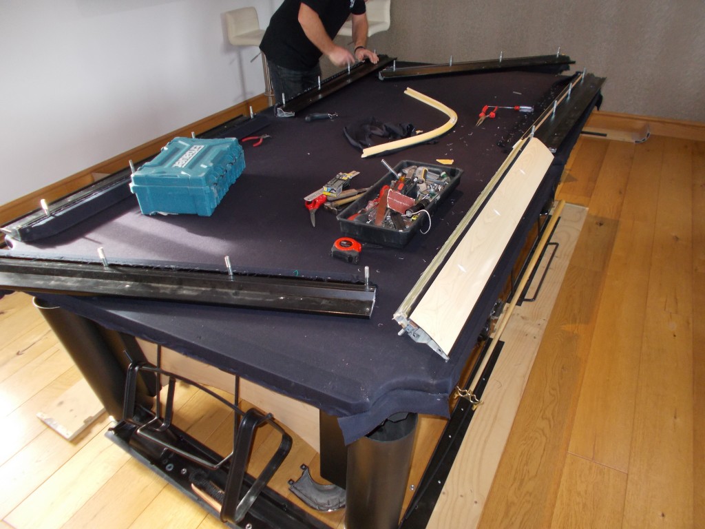 Sam K steel pool table , re-rubber , re cover , attend to slate joints ...
